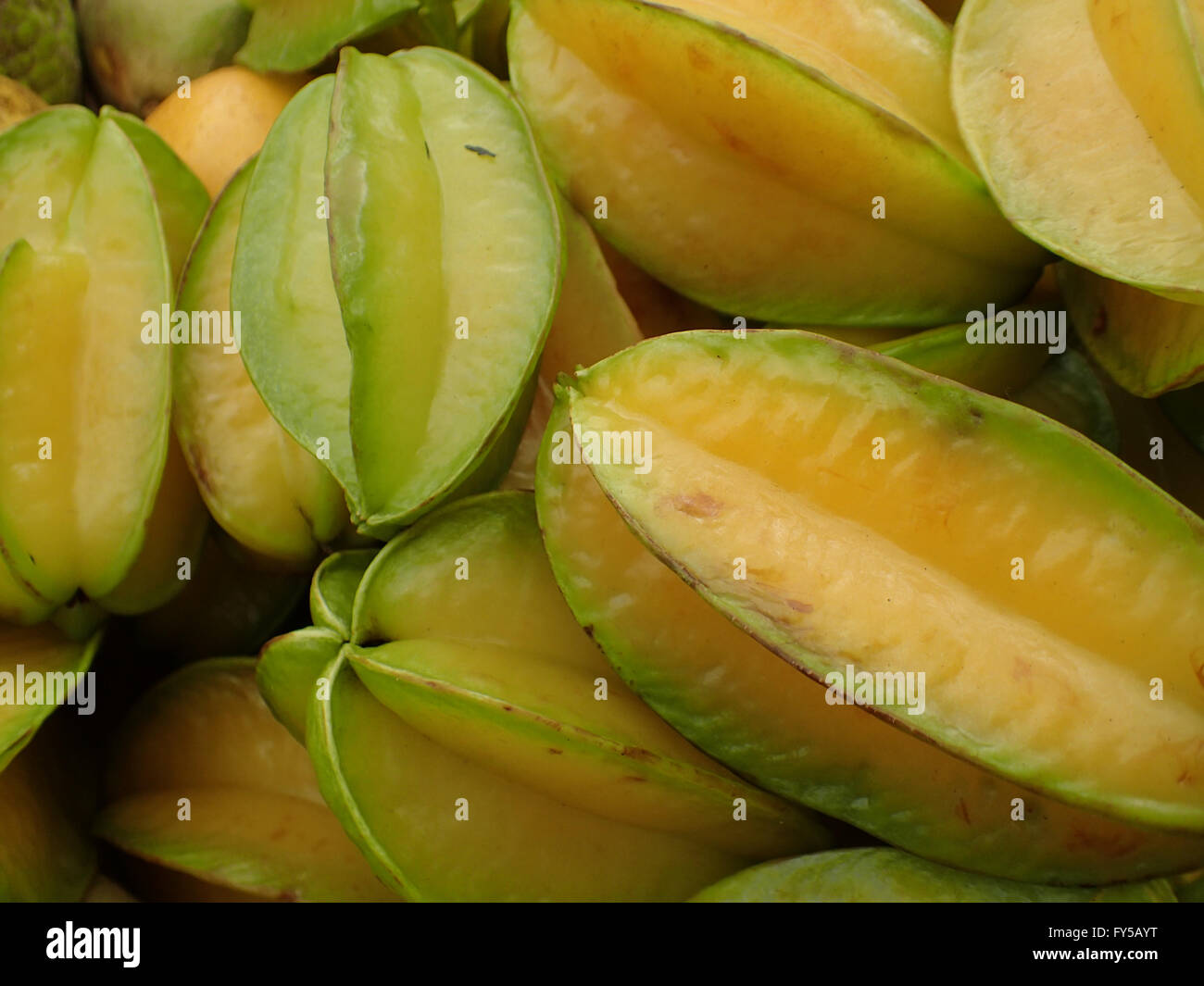 Starfruit eating hi-res stock photography and images - Alamy