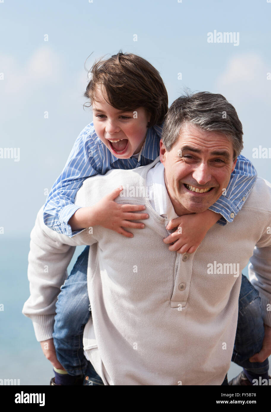 Shoulder ride beach hi-res stock photography and images - Alamy