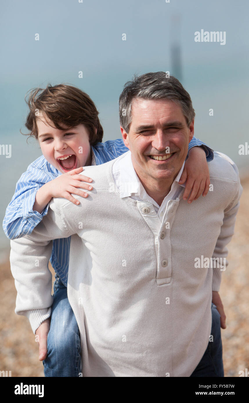 Shoulder ride beach hi-res stock photography and images - Alamy