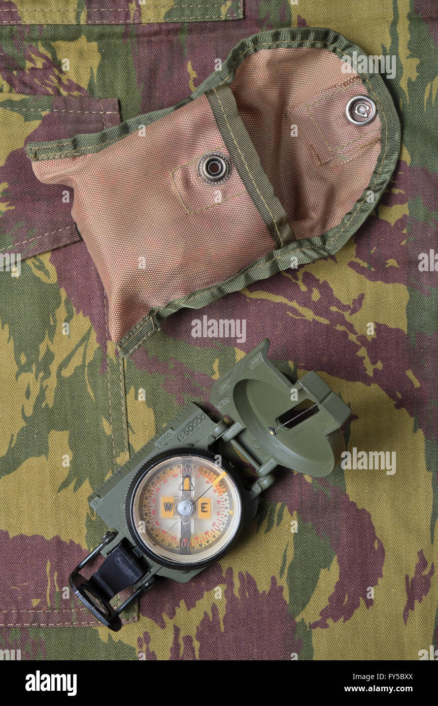 Military compass overview on a camo background Stock Photo - Alamy