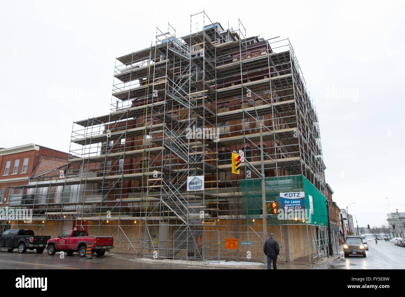 Scaffolding around a building under construction in downtown Kingston ...