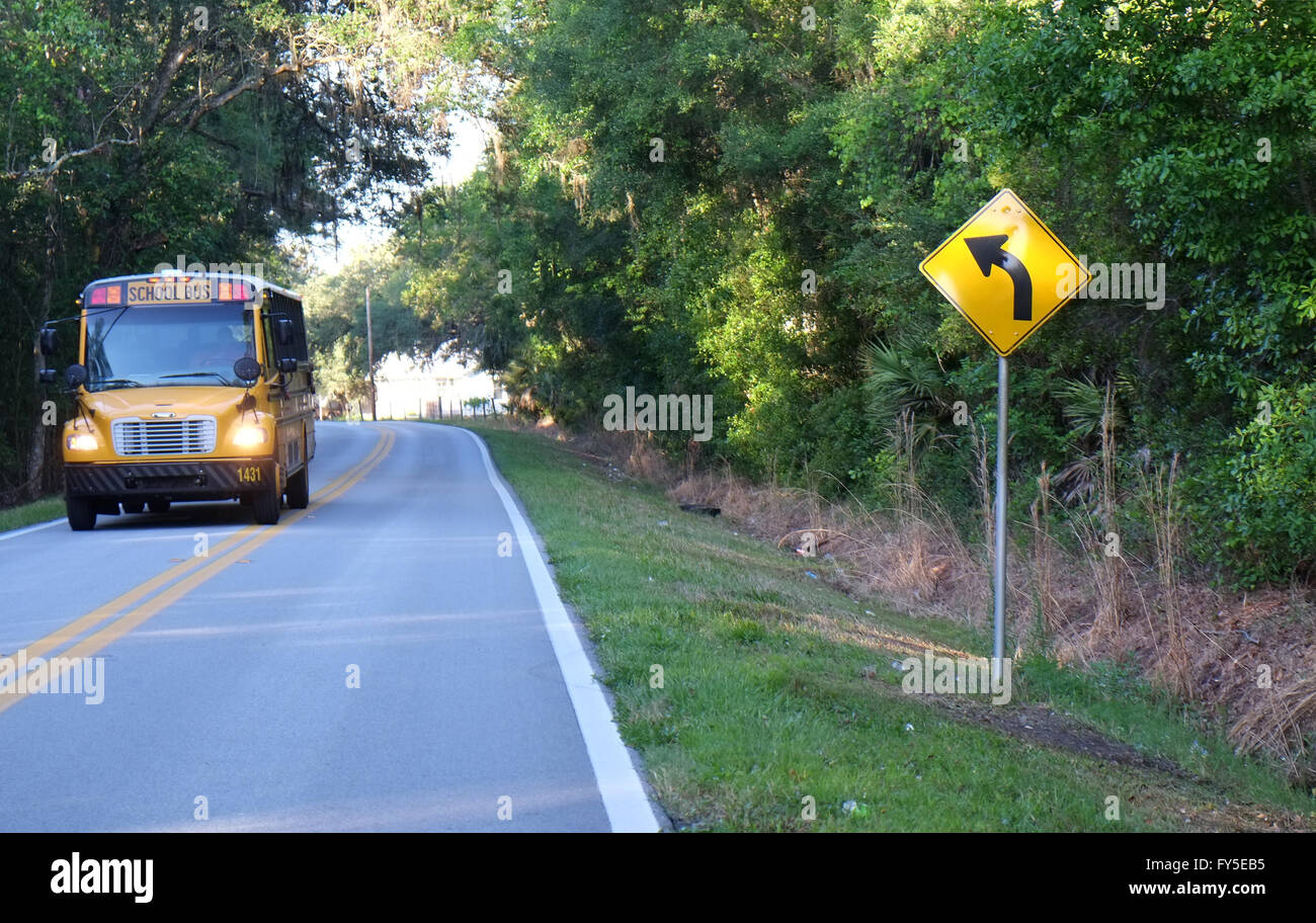 American school bus on a small county road in Florida, near Davenport ...