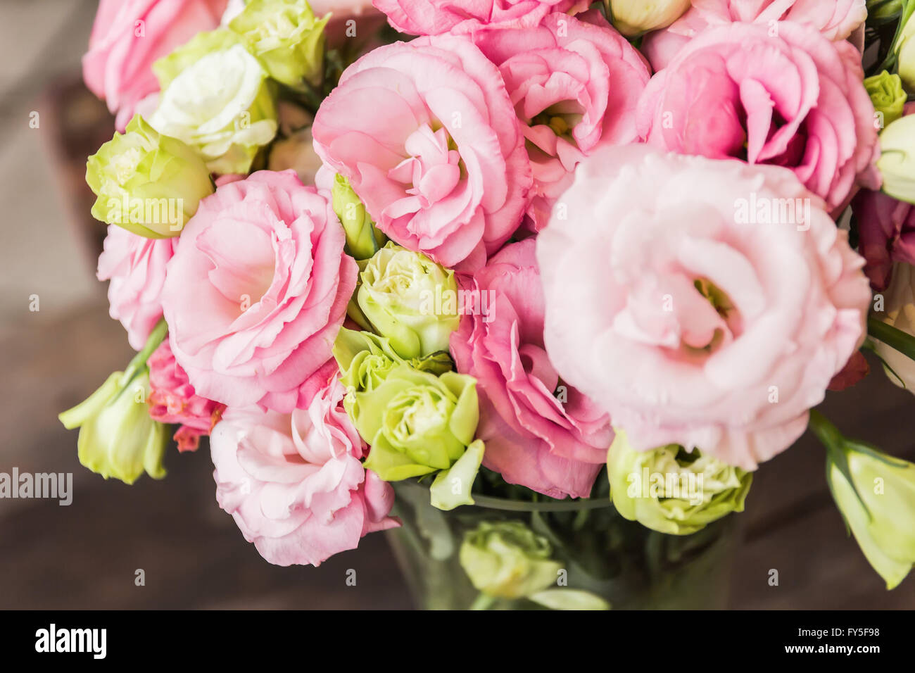 Beautiful pink flowers in vase Stock Photo - Alamy