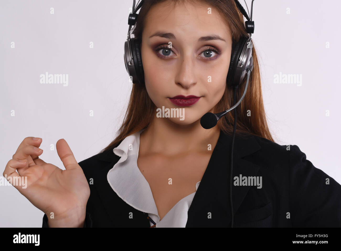 Close up of beautiful telemarketer woman. Isolated white background ...