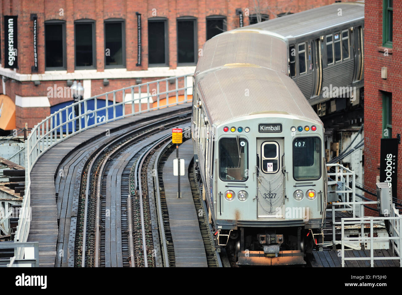 A CTA Brown Line train as it negotiates a curve on elevated tracks in ...