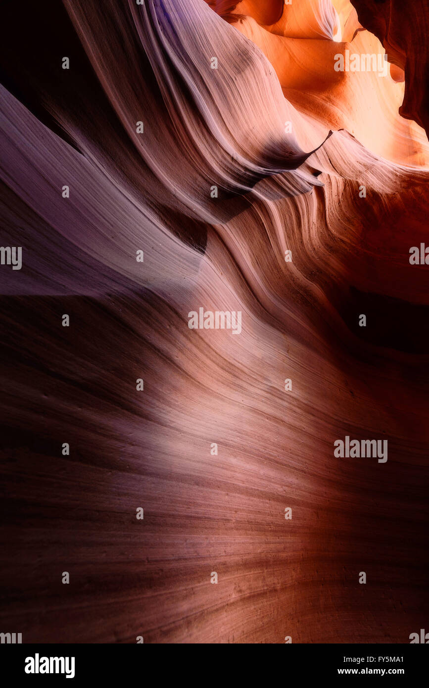 Red sand rock eroded by water and wind inside mountain cave, antelope ...