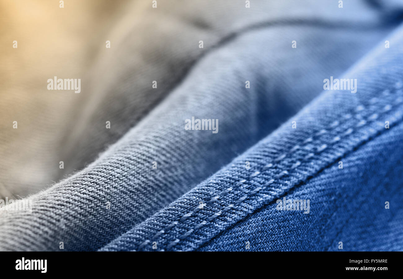 Textile and fabric industry background Stock Photo - Alamy
