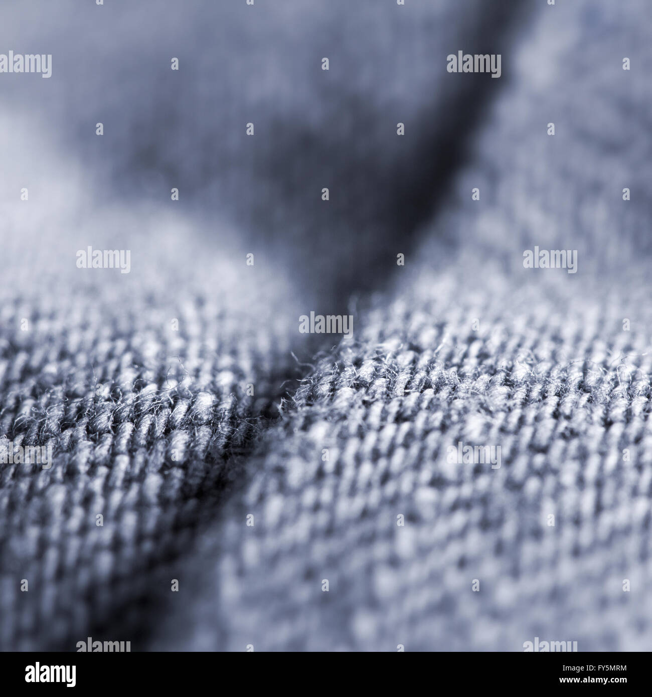 Textile and fabric industry background Stock Photo - Alamy