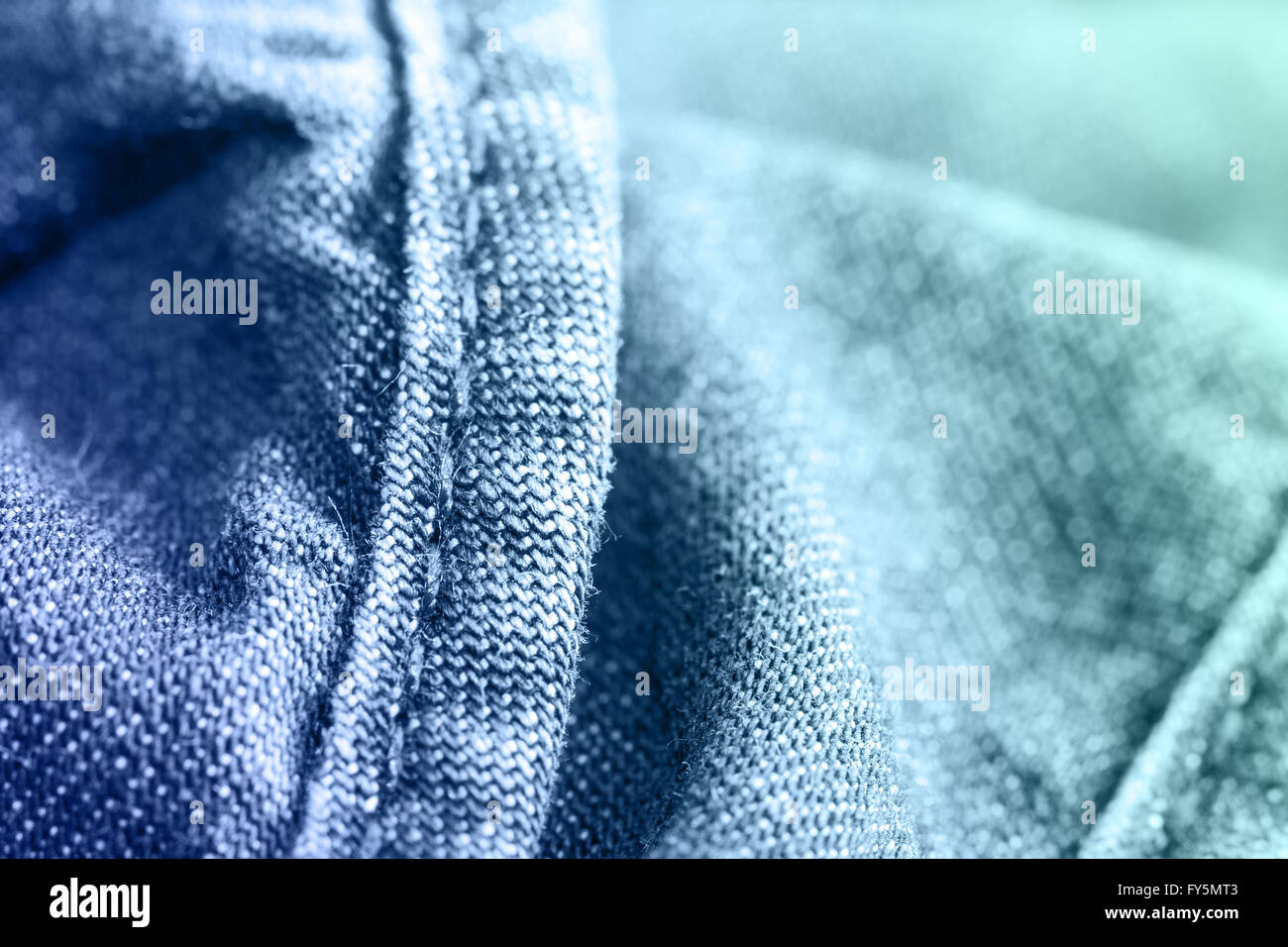 Textile and fabric industry background Stock Photo - Alamy