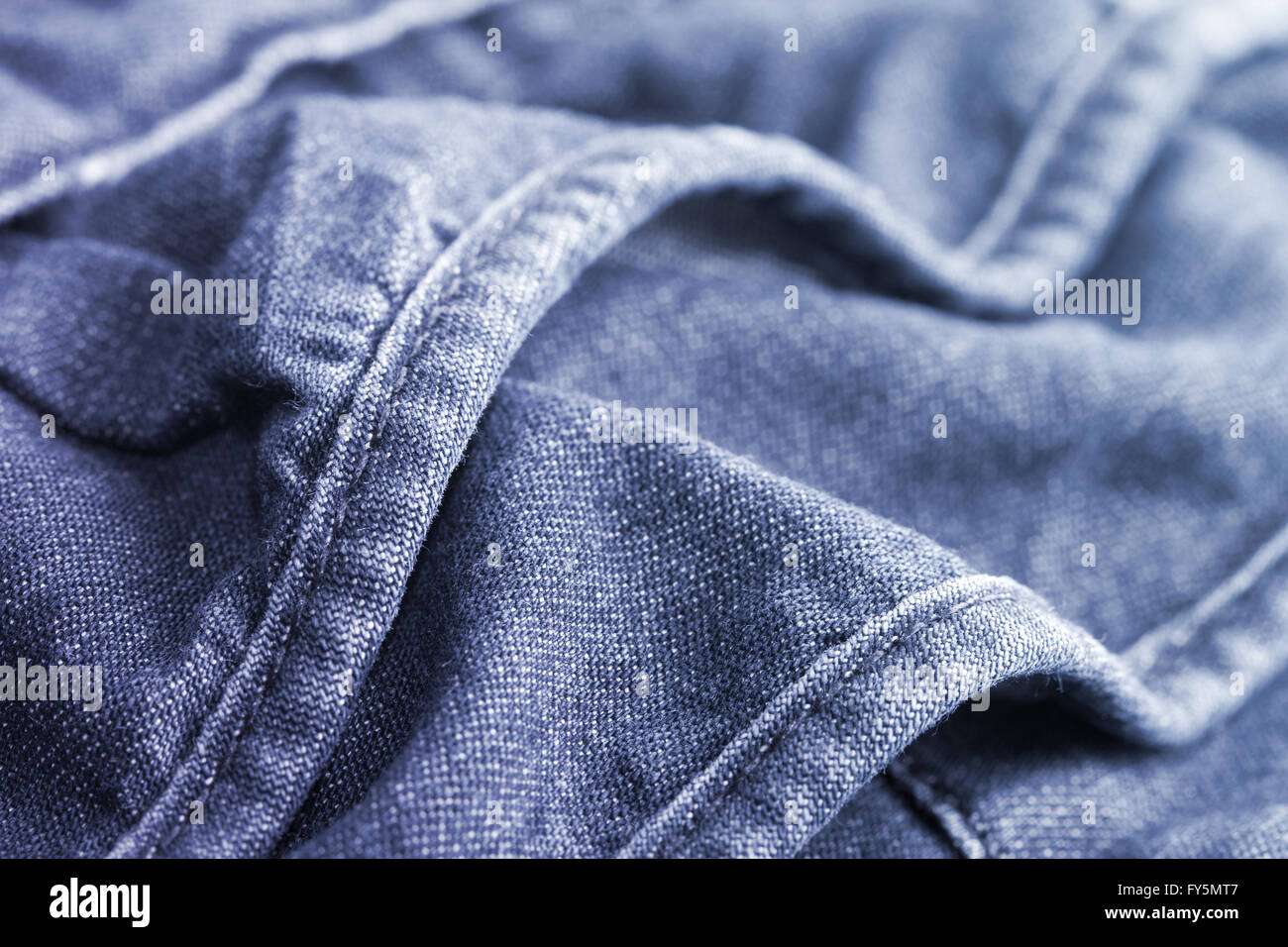 Textile and fabric industry background Stock Photo - Alamy