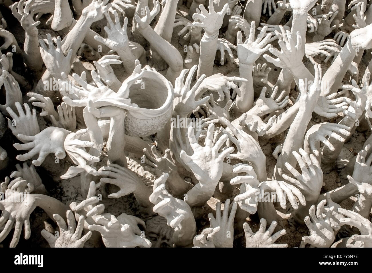 Hands Statue At Wat Rong Khun Stock Photo - Alamy