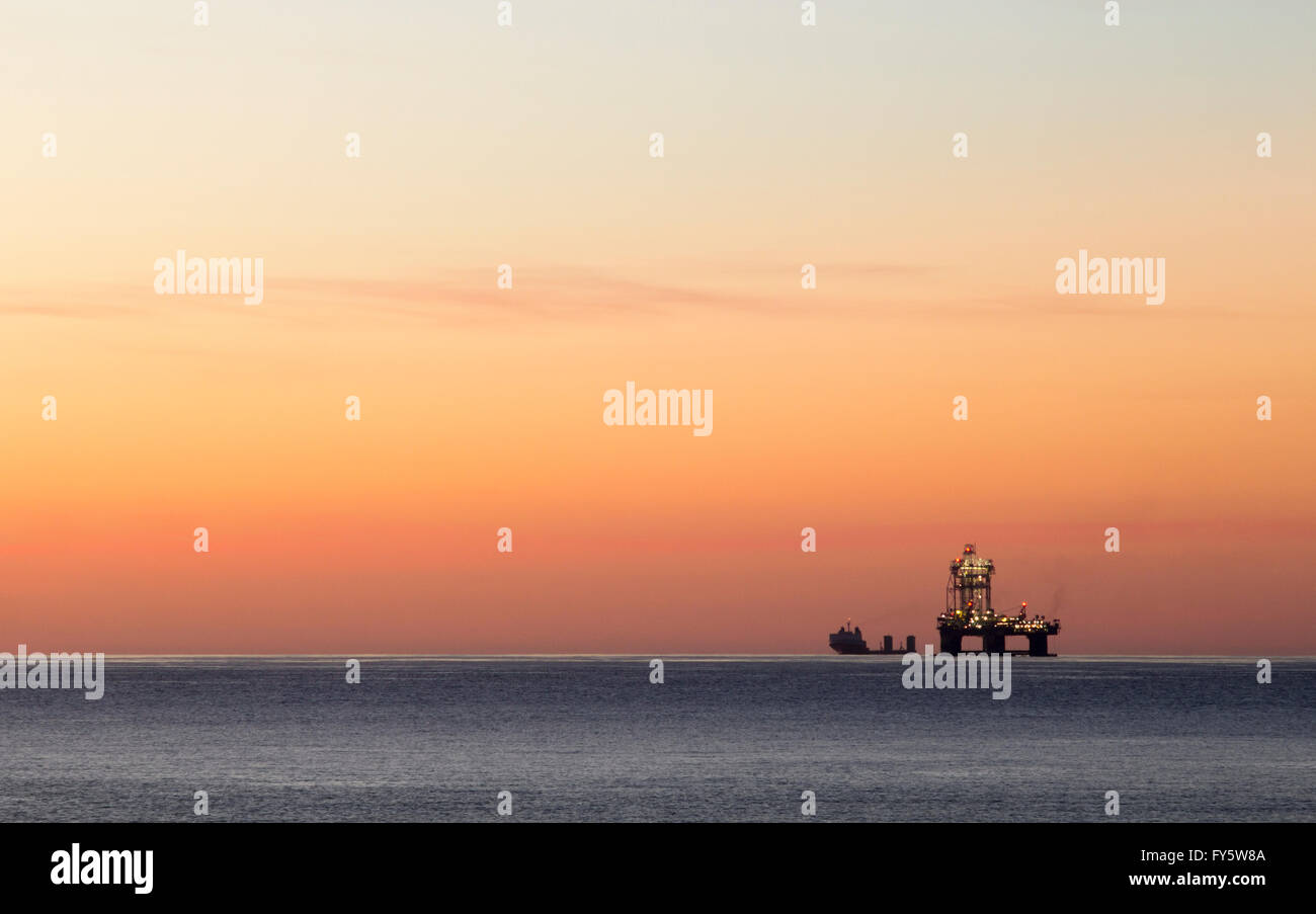 Offshore Oil rig at sunrise Stock Photo - Alamy