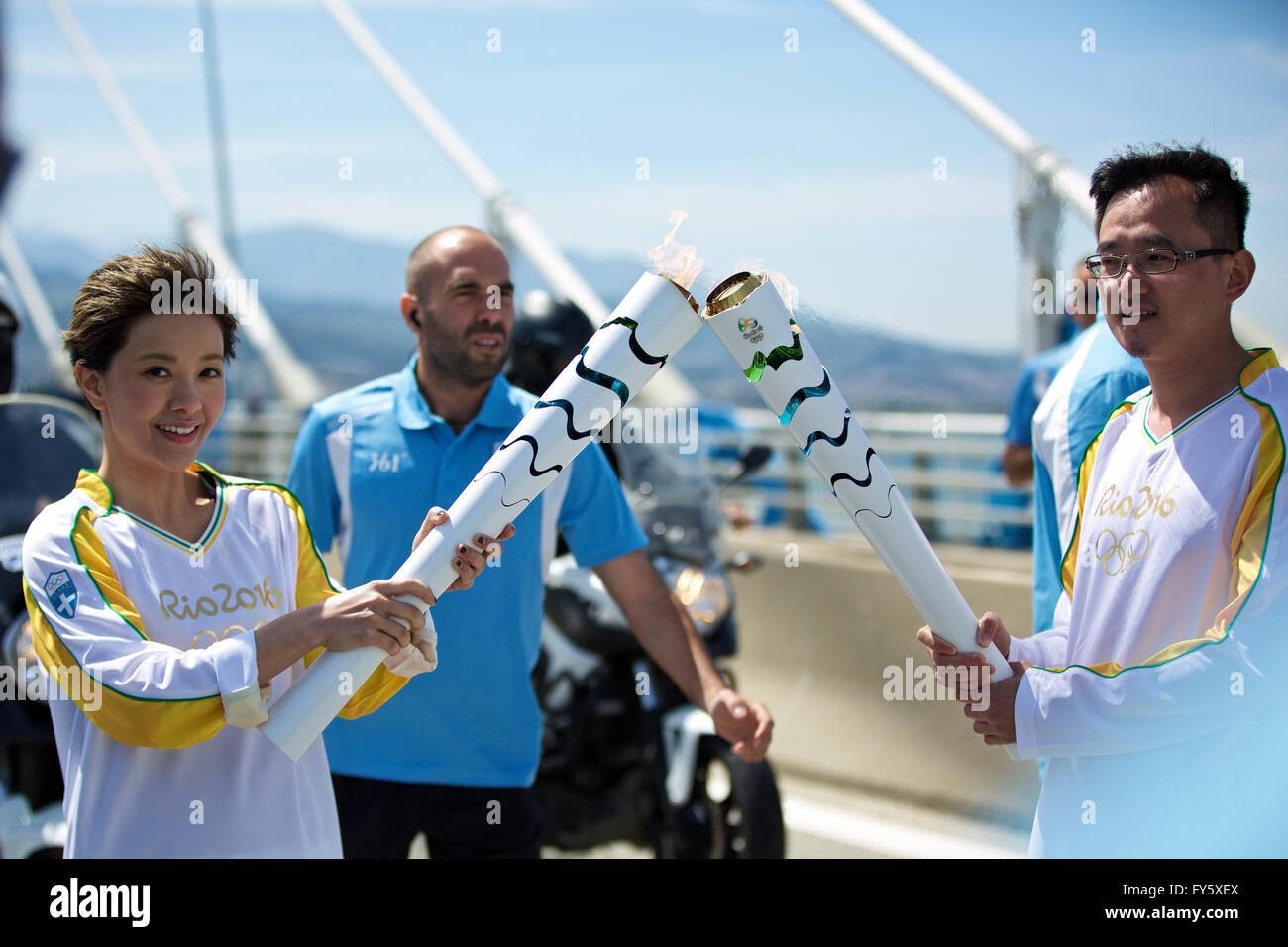 Patra, Chinese actress Amber Kuo (L) passes the flame to president of ...