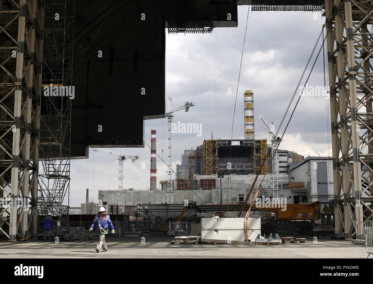 April 22, 2016 - Worker is seen in front the Chornobyl New Safe ...