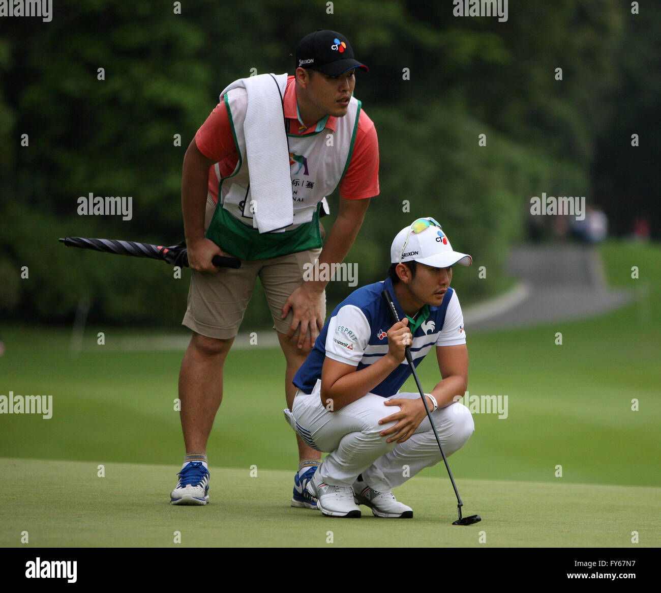 Shenzhen, China's Guangdong Province. 23rd Apr, 2016. Lee Soo Min(R) of ...