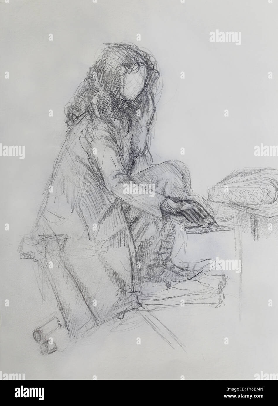 young woman sitting in front of computer drawing , paper background ...