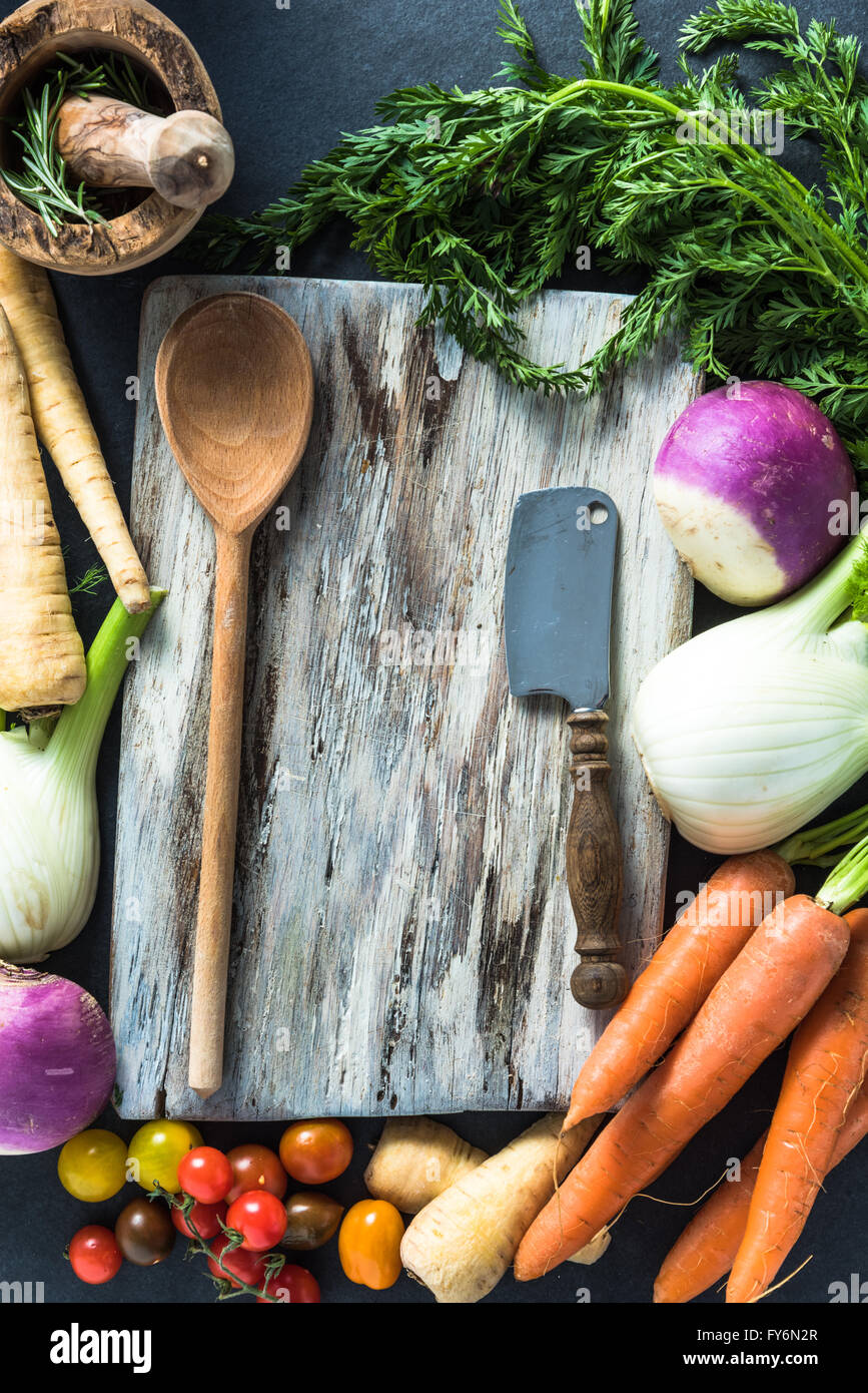 Cooking recipe or menu concept, chopping board with copy space and root ...