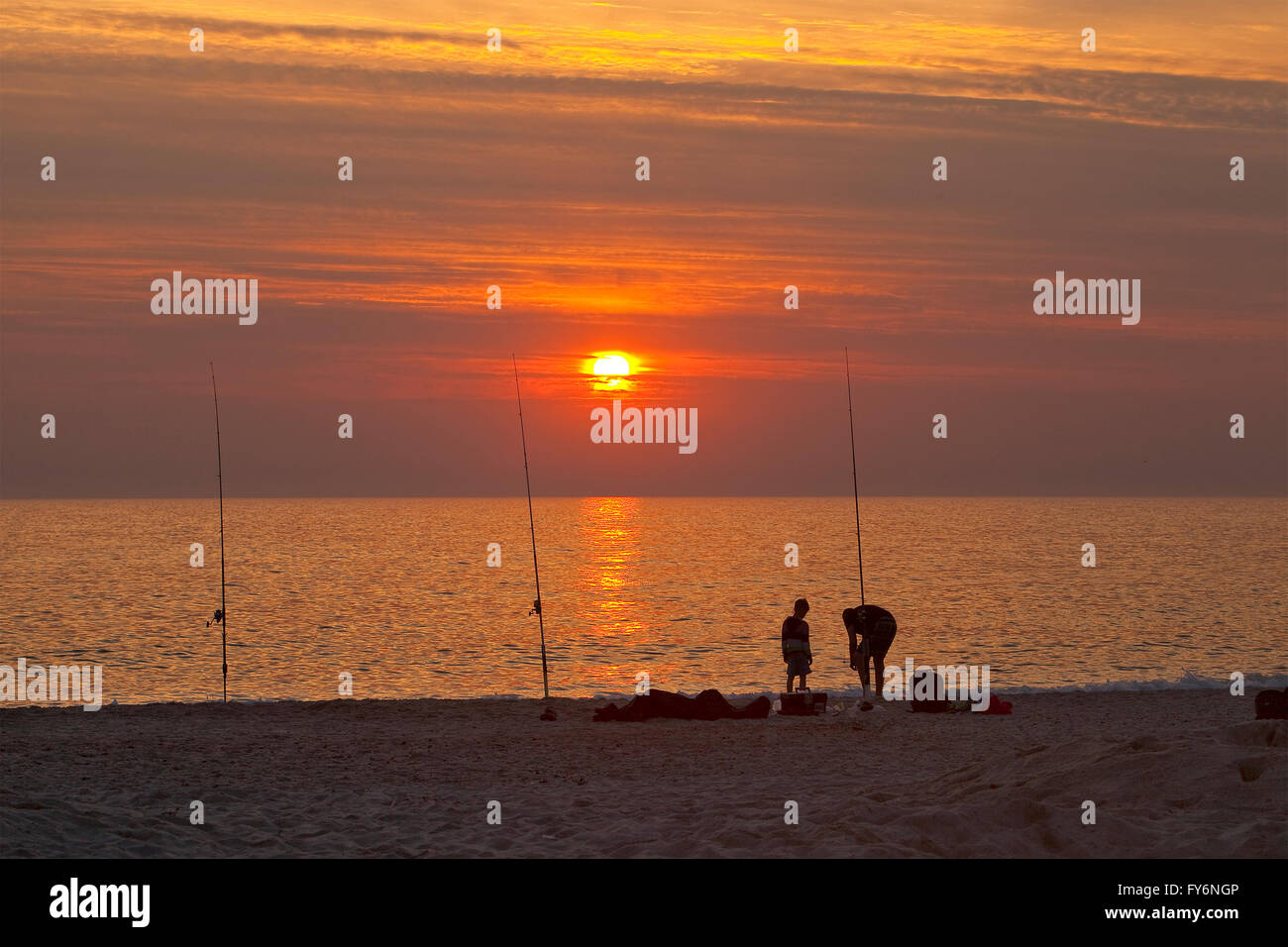 Fishing At Sunset. One of the secrets of fishing is that the fish feed ...