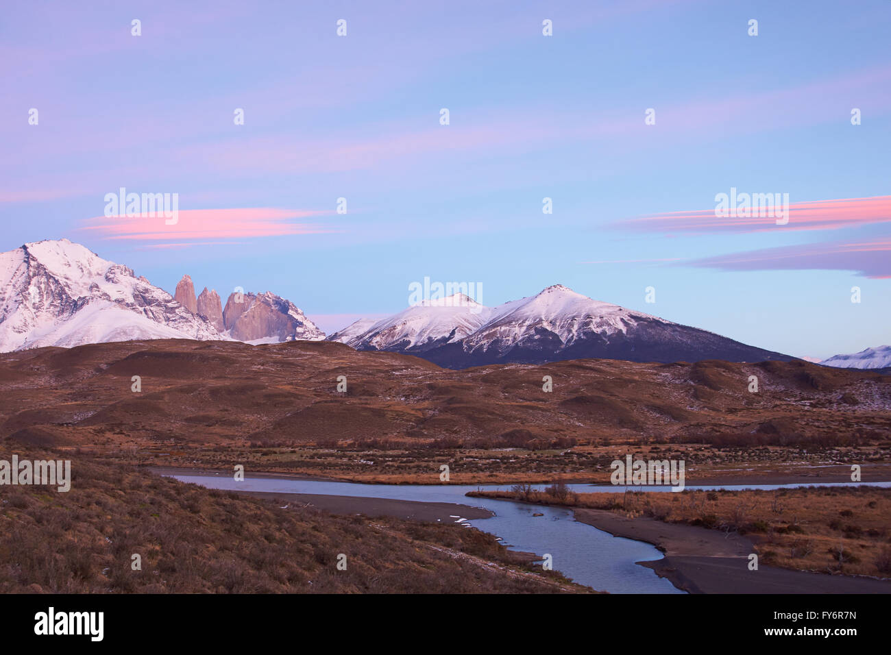 Sunrise over the granite spires that give the name to the Torres del ...