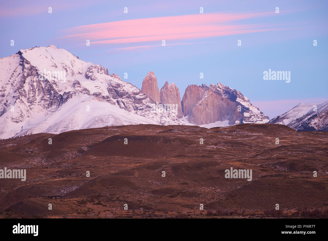Sunrise over the granite spires that give the name to the Torres del ...