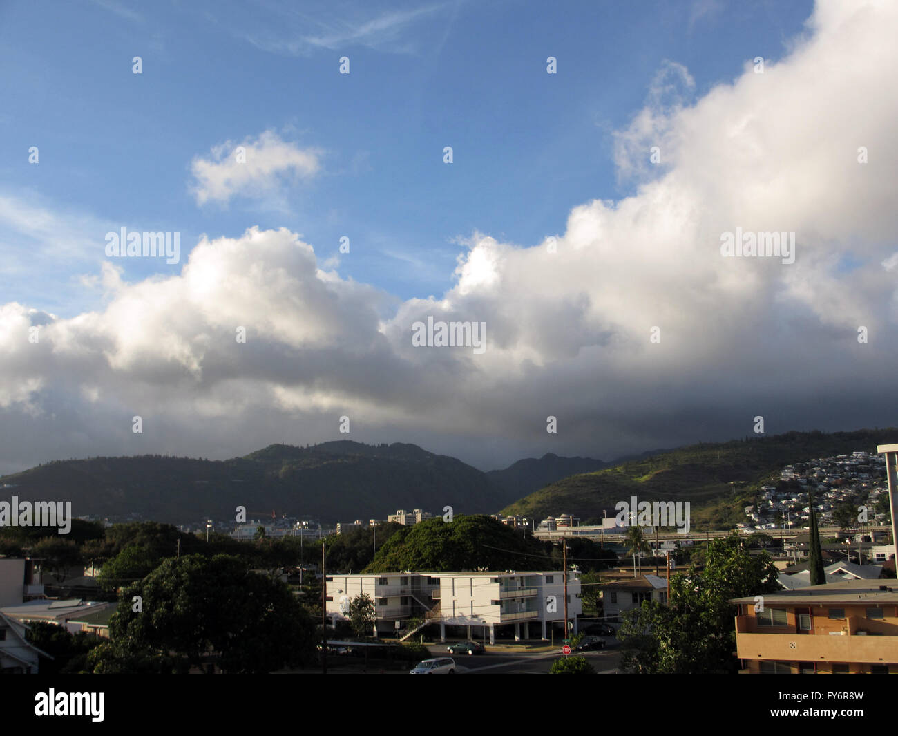 Kapahulu Town Scape in Honolulu, Hawaii with mountain ranges in the ...