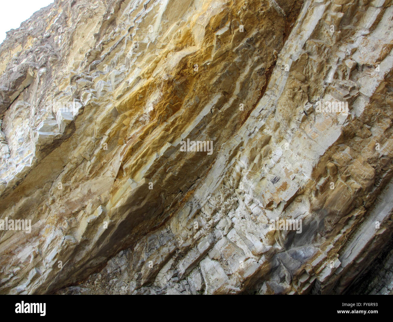 Jagged Rock Cliff in Yellow-Orange hues, good for patterns or ...