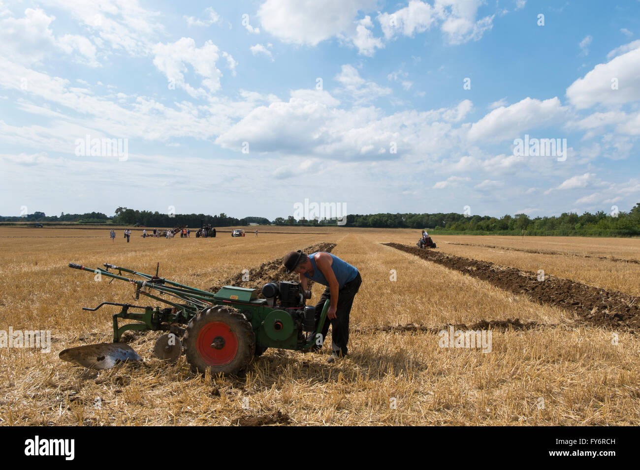 The Ploughman with vintage two wheel powered plough at the Fairford ...