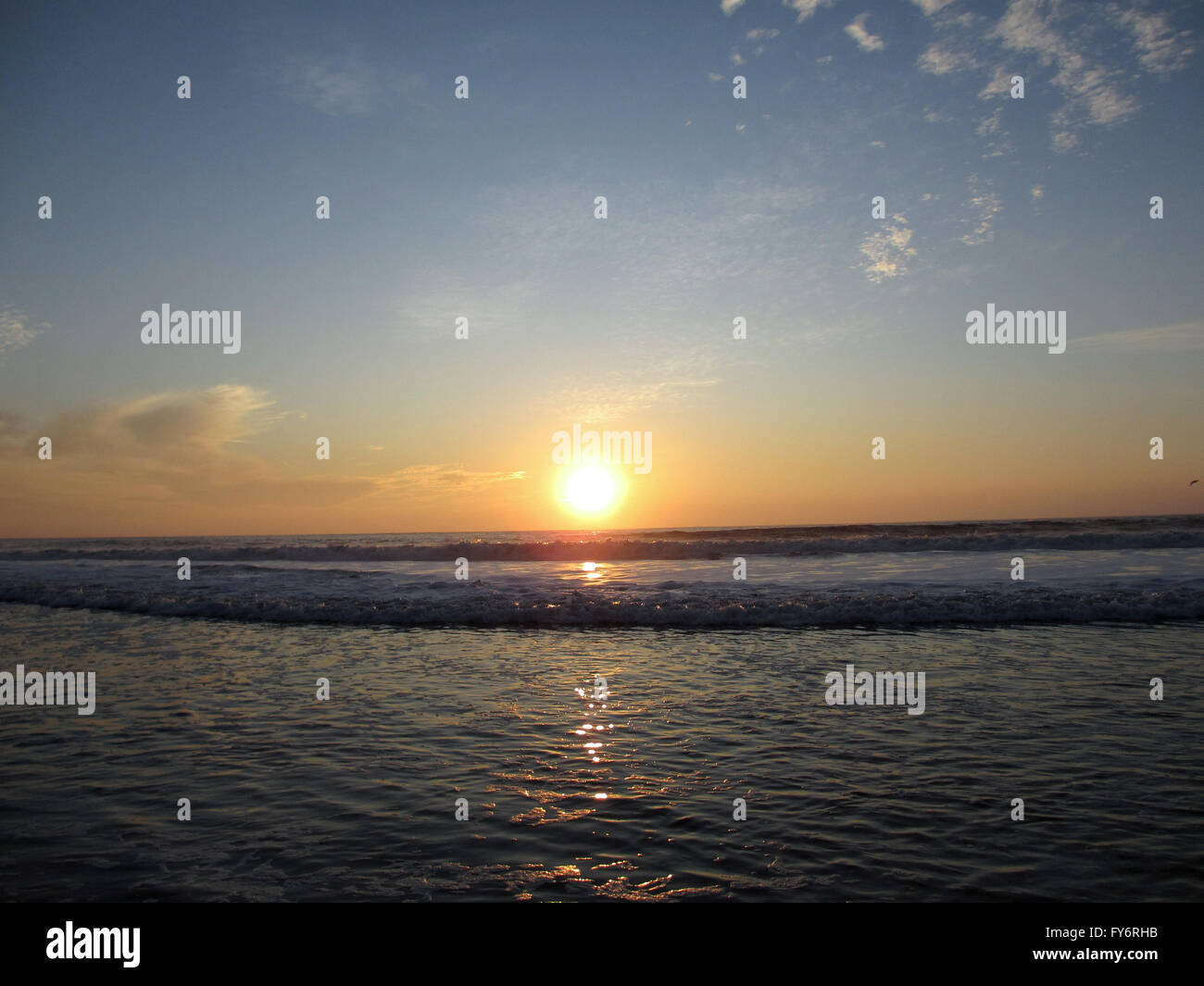 Sunset over ocean waves of Half Moon Bay in California Stock Photo - Alamy