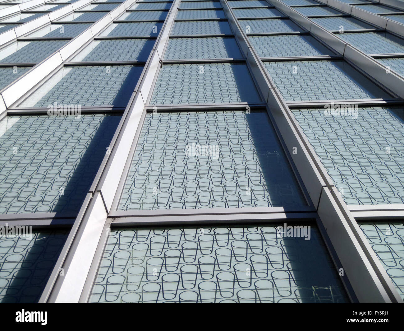 Modern Blue Windows with pattern on glass looking upward Stock Photo ...