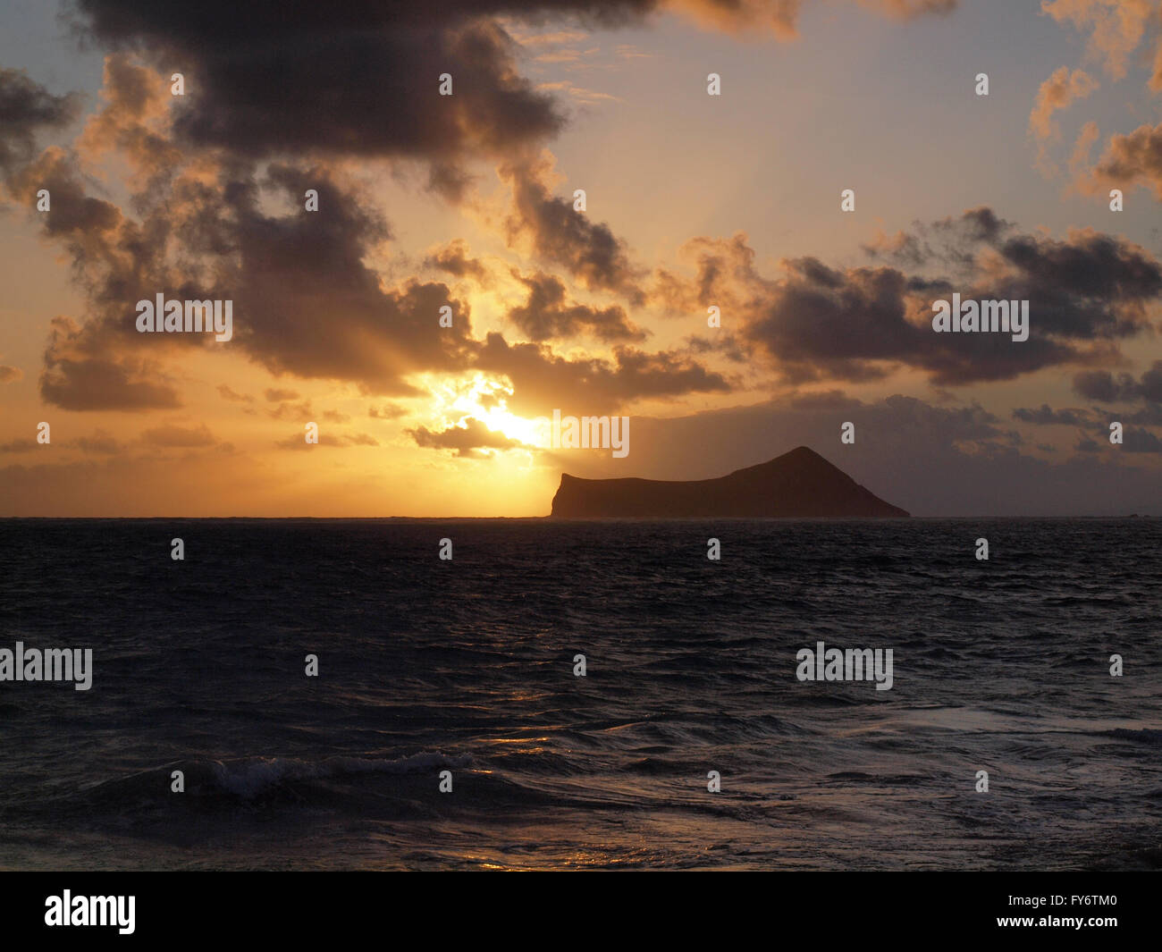 Sunrise next Rabbit Island over Waimanalo Bay, on Oahu, Hawaii Stock ...