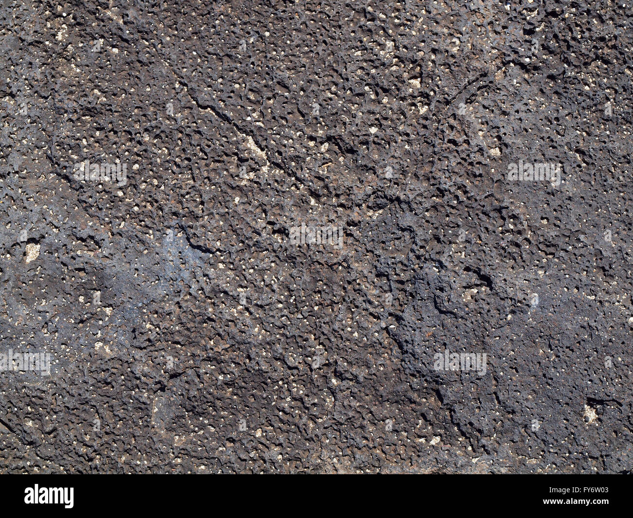 Lava rock with bits of sand on top on Oahu's Makapuu beach Stock Photo ...