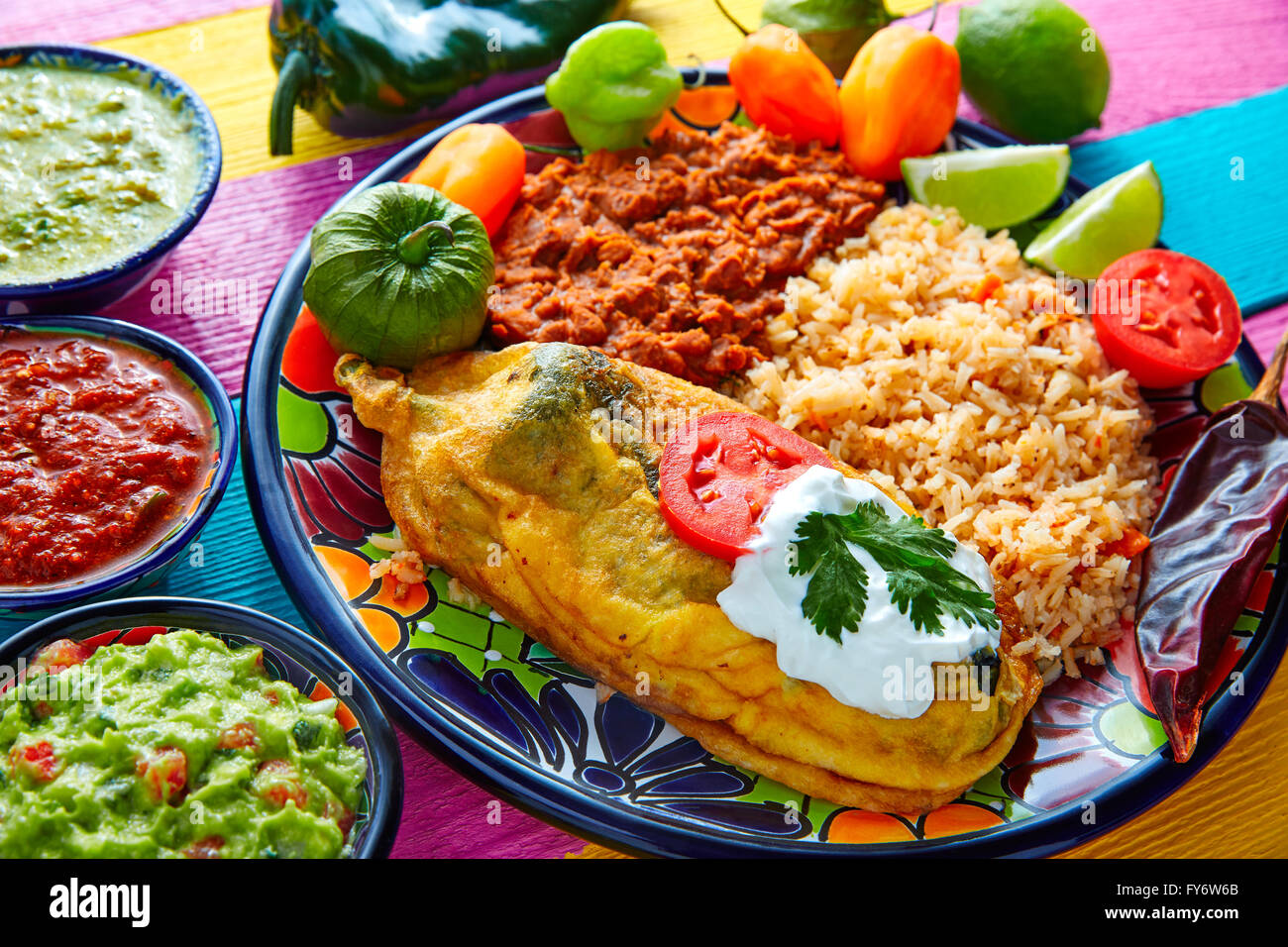 Chili relleno chili pepper poblano filled with cheese in dish with with ...