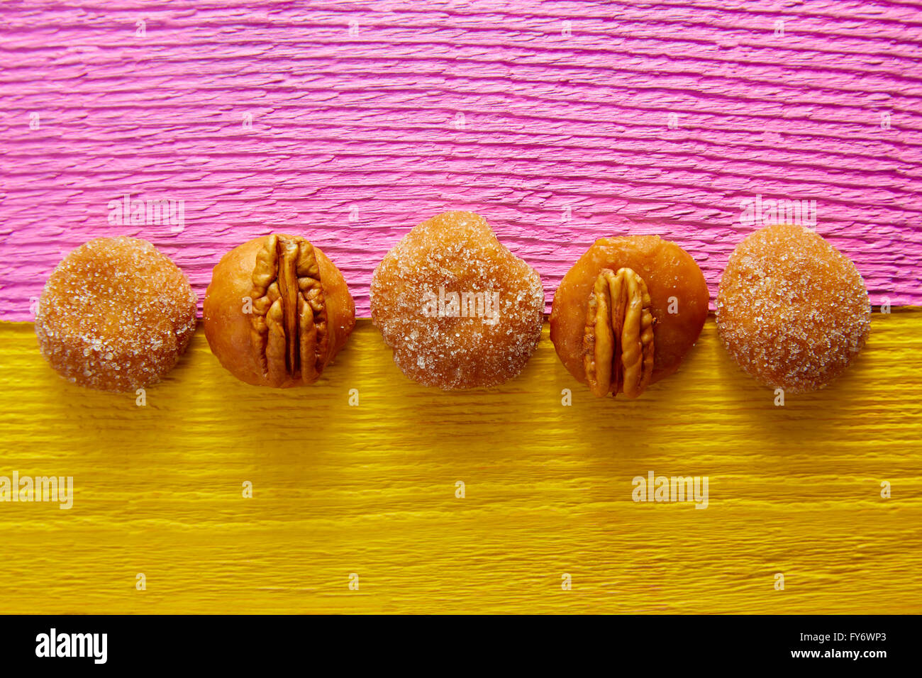 Cajeta caramel Mexican candy sweets with sugar and pecan nuts in a row ...