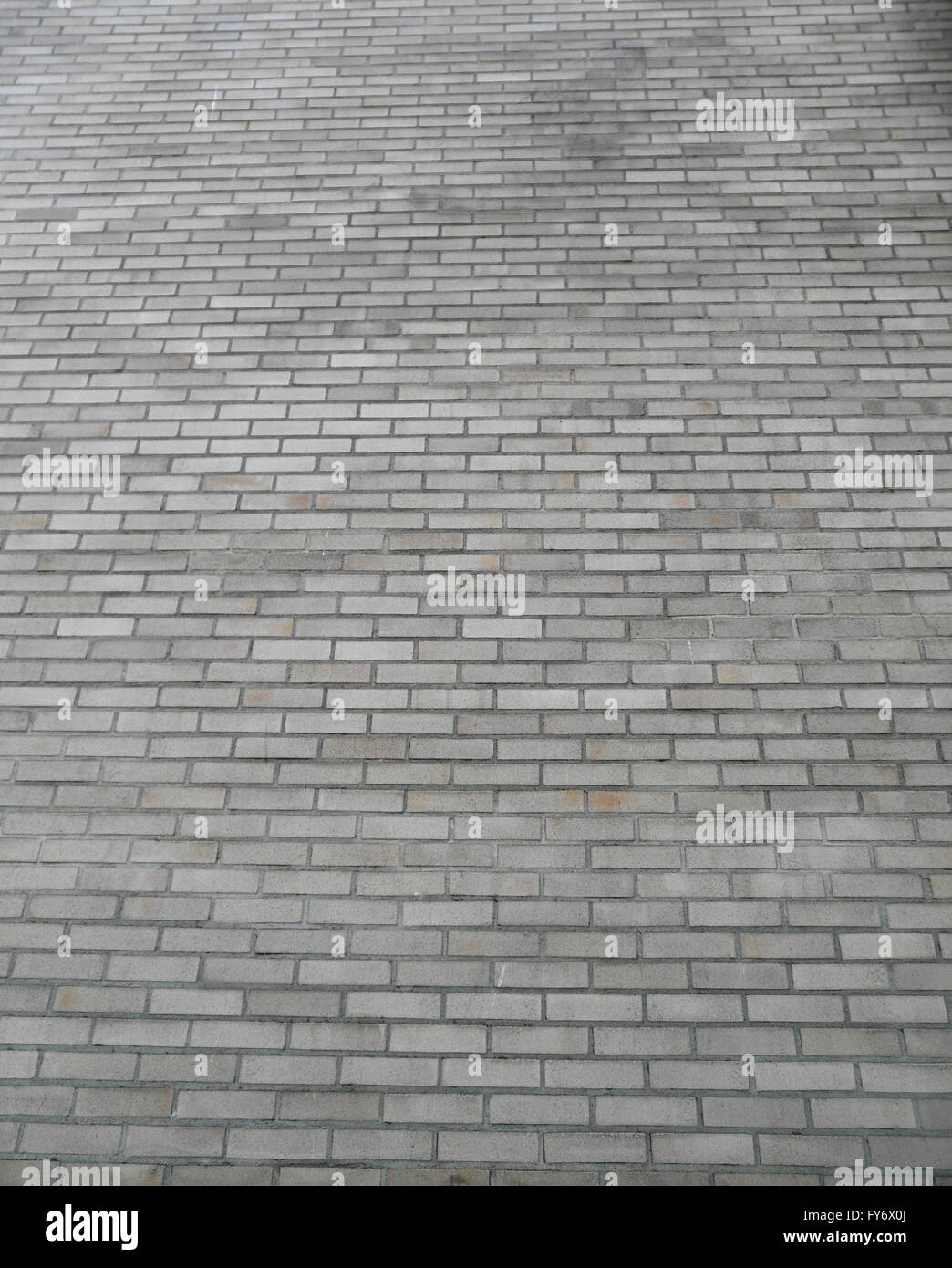 Gray stone brick path leading into the distance Stock Photo - Alamy