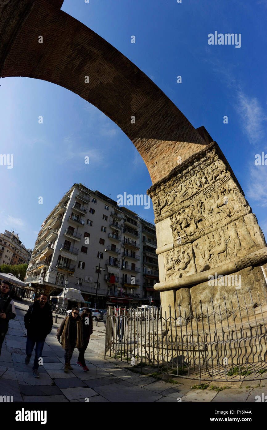 People passing under the dominating Arch of Galerius Triumphal gate or ...