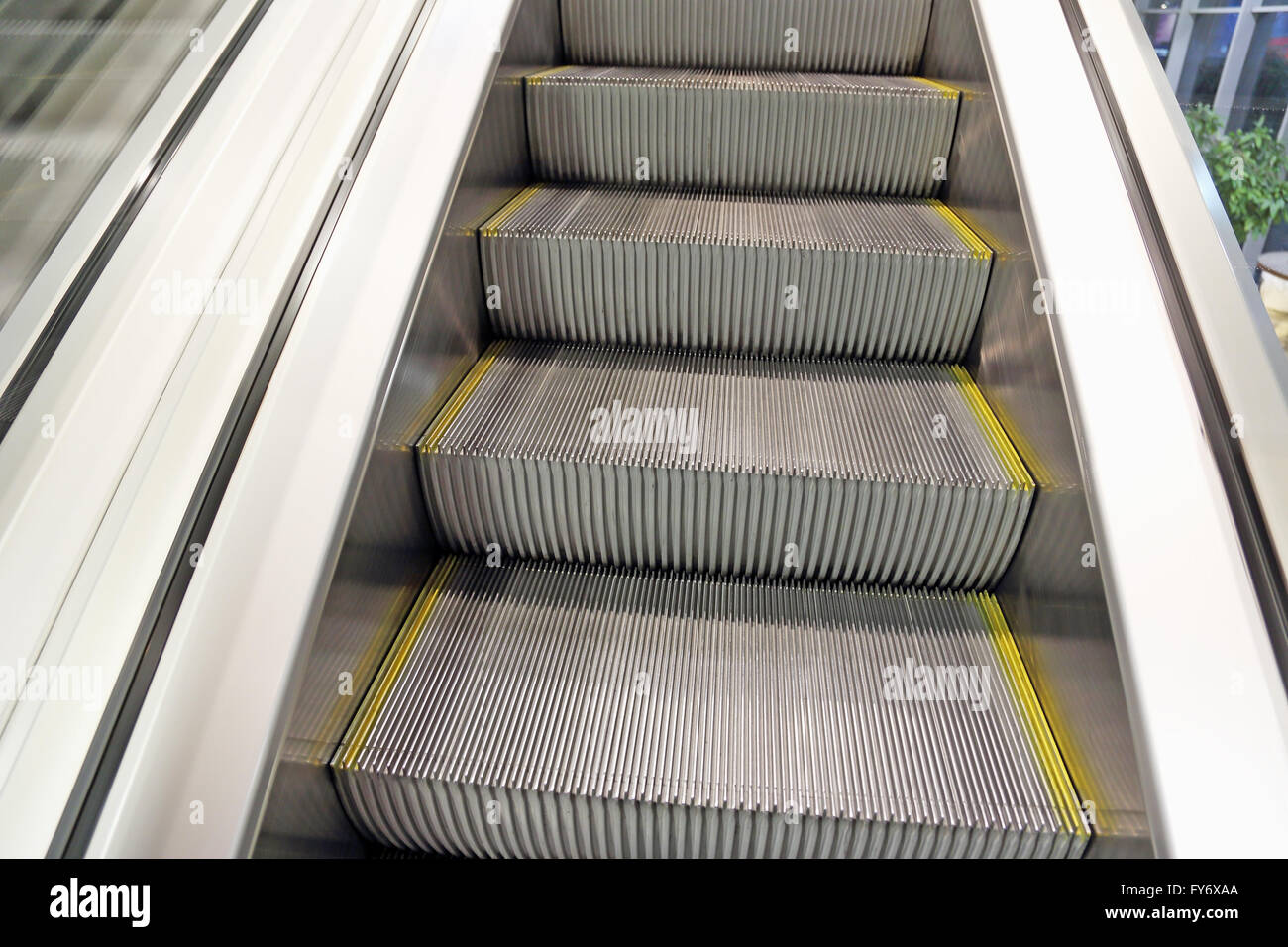 metal escalator steps Stock Photo - Alamy