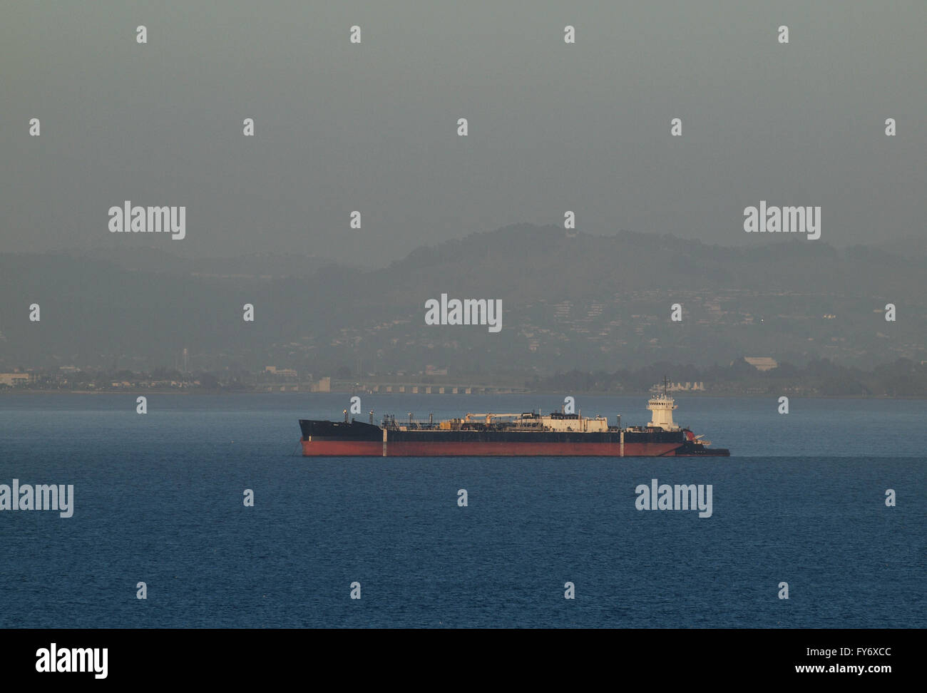 Cargo ship rest anchored in San Francisco Bay outside of Oakland Harbor ...