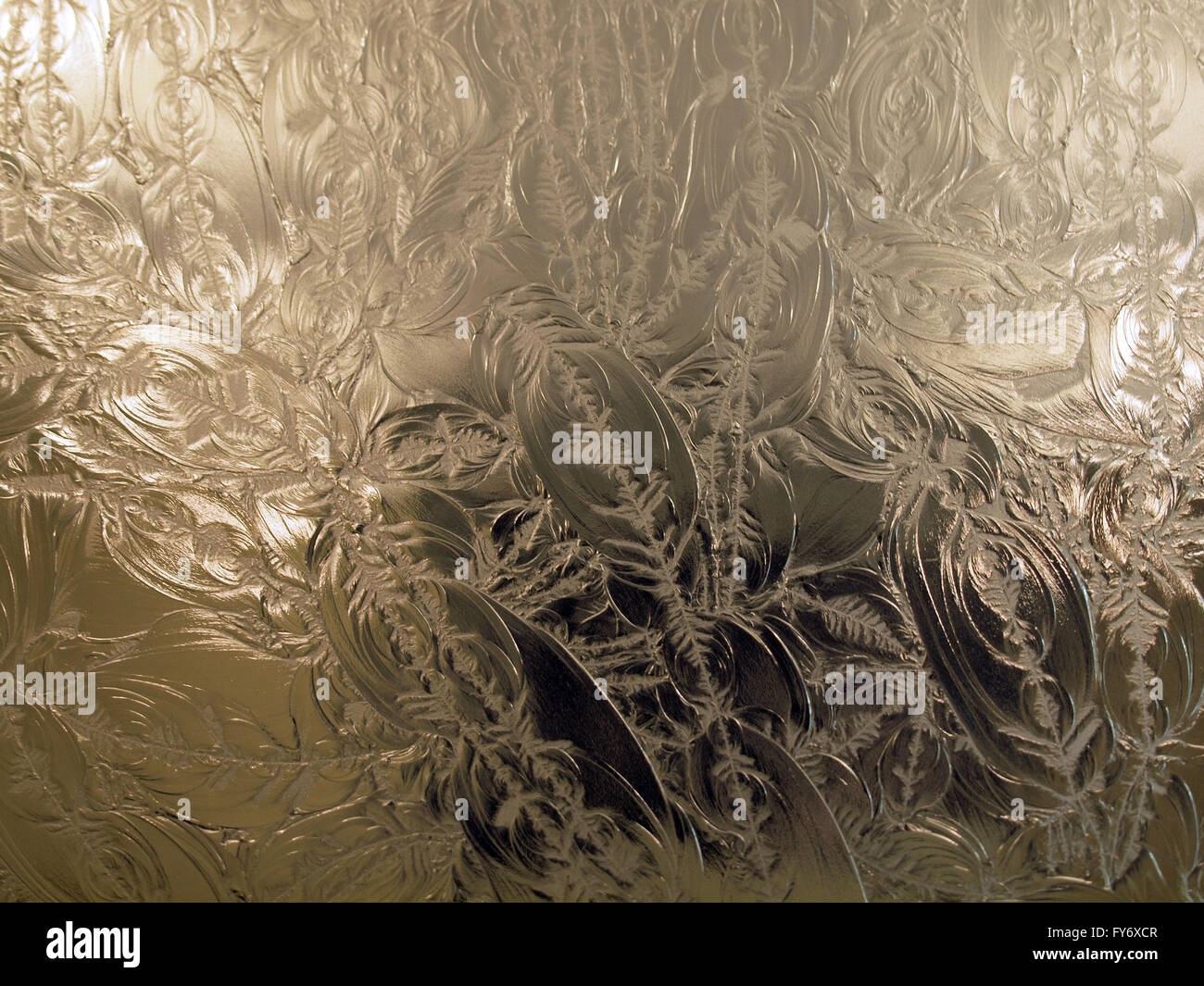 Frosted Glass Flowers in bloom like pattern with light shinning though ...