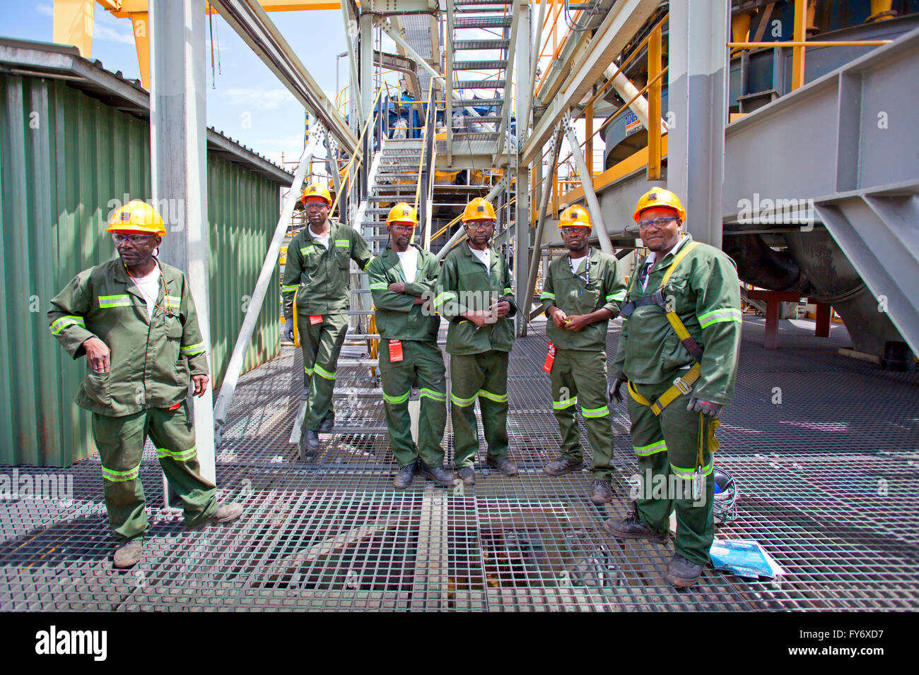 Large group of First Quantum mine employees posing on site Stock Photo ...