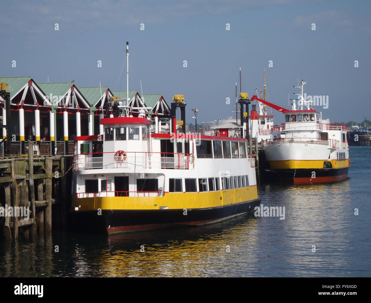 Two Casco Bay Ferries in the harbor of Portland Maine. The Ferries are ...