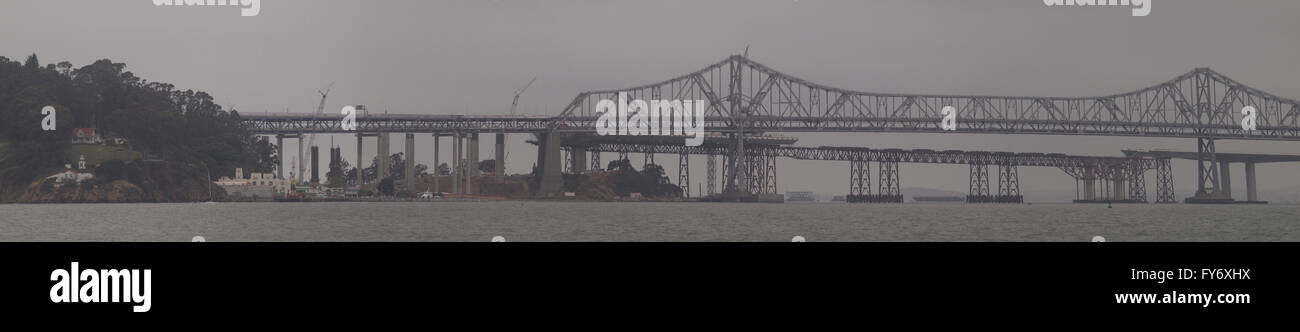 Oakland side of Bay Bridge with new bridge being built behind it ...
