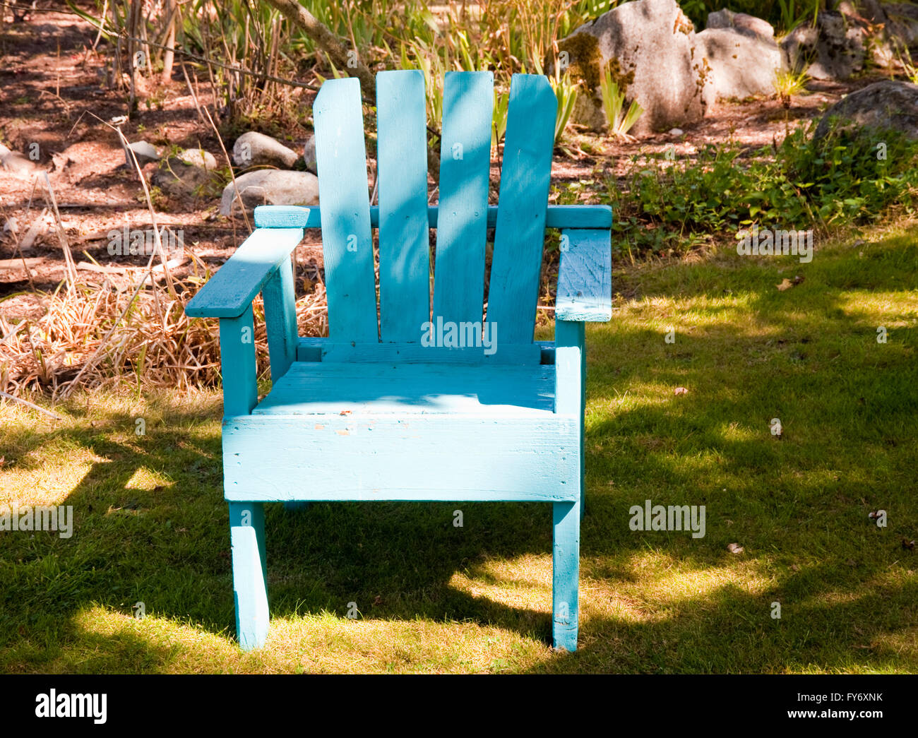 Blue lawn chair Stock Photo - Alamy