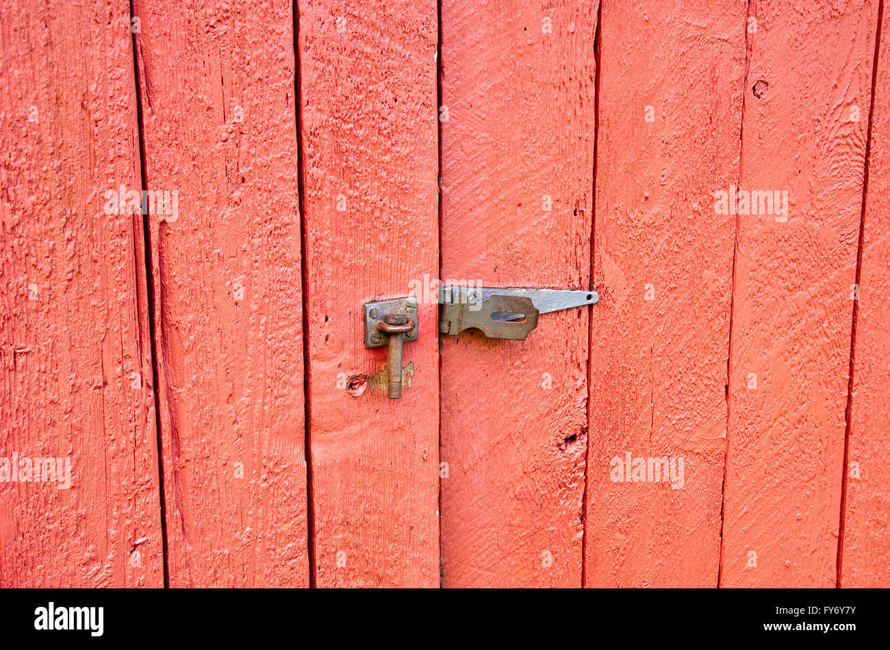 Red shed door detail Stock Photo - Alamy