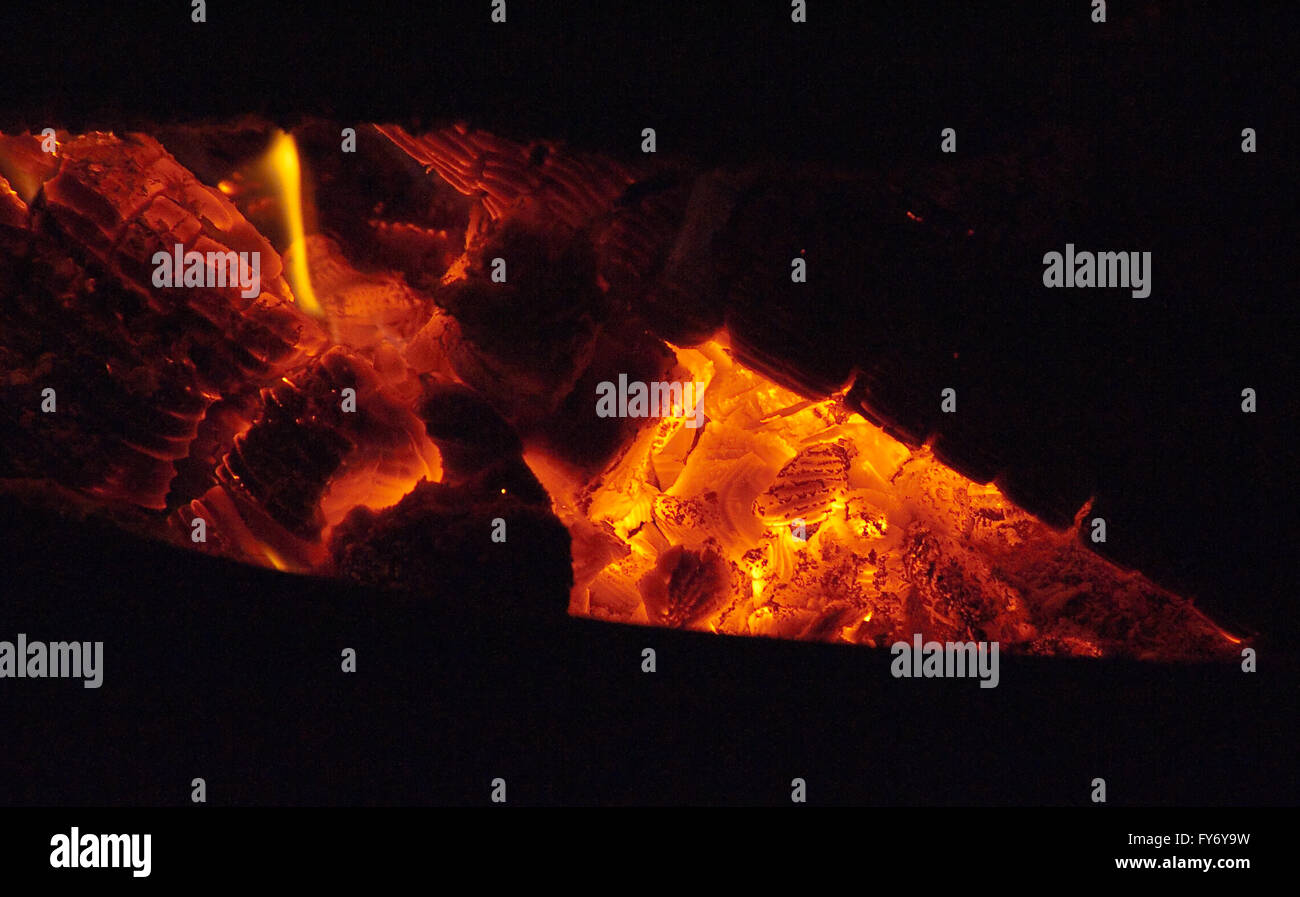 Blazing fire in a wood burning stove Stock Photo - Alamy