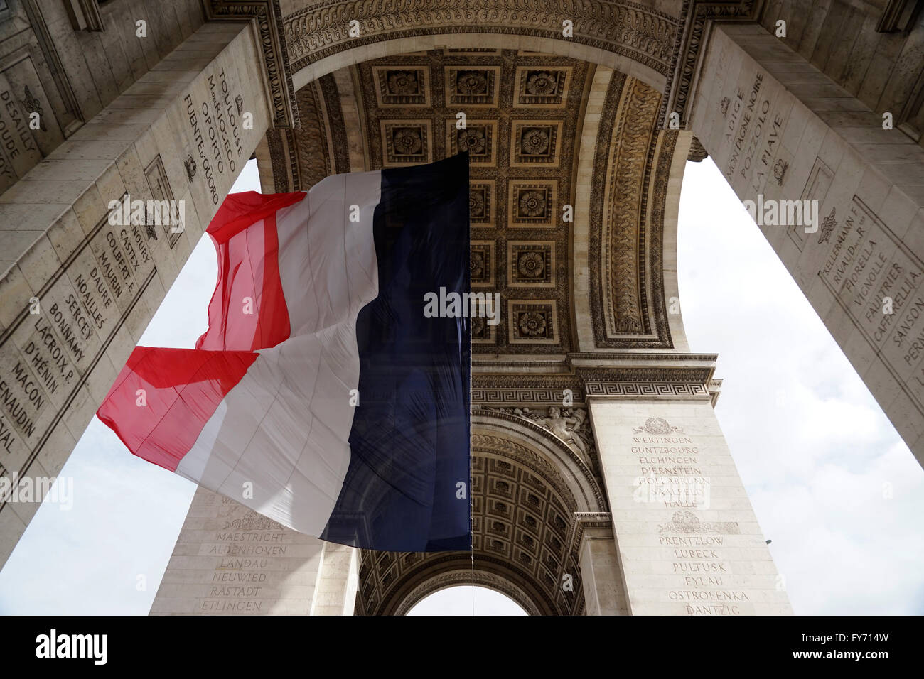 French National flag flying under Arc de Triomphe, Paris,France Stock ...