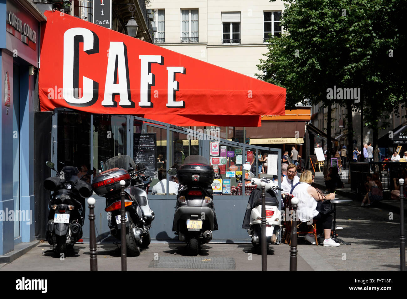 A cafe in le Marais with sign of Cafe, France,Paris Stock Photo - Alamy
