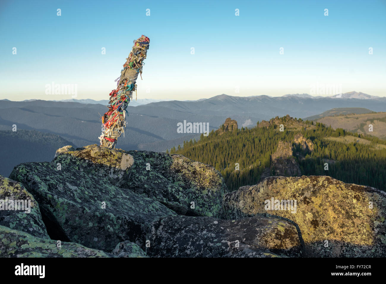 Colorful flags on mountain ridge Stock Photo - Alamy