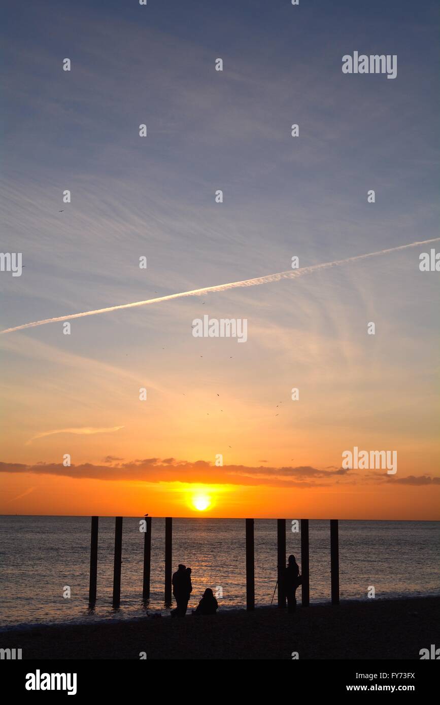 Sunset over Brighton beach UK Stock Photo - Alamy