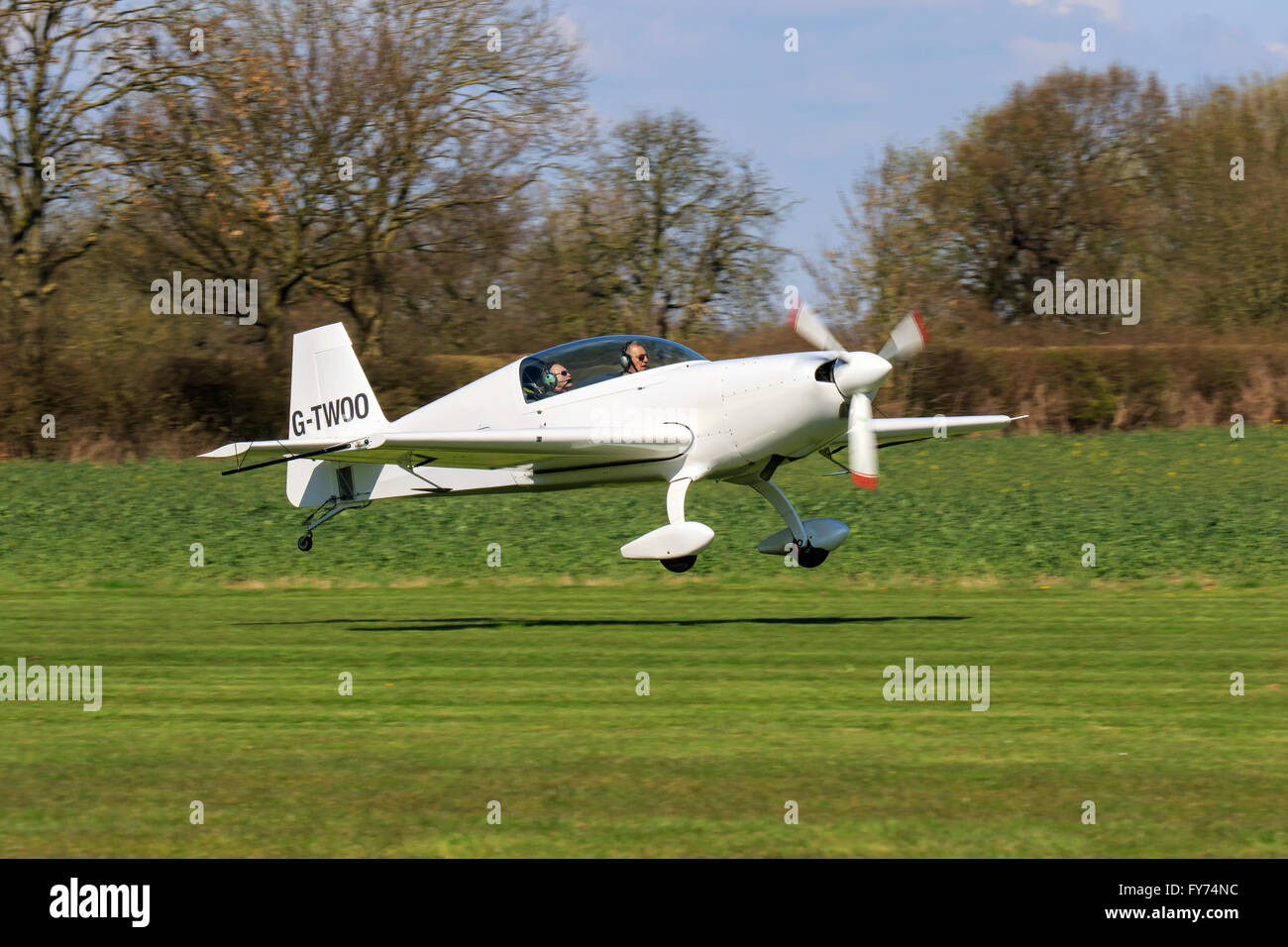 Extra EA300-200 G-TWOO in flight landing at Breighton Airfield Stock ...