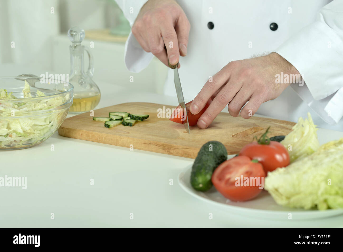 Man cooking in kitchen Stock Photo - Alamy
